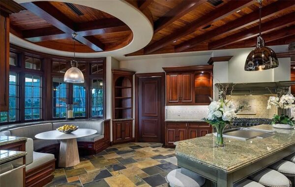 Palatial Palm Beac Inspired Mansion with 665 Feet of Wrap-Around Water ...