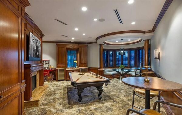 Palatial Palm Beac Inspired Mansion with 665 Feet of Wrap-Around Water ...