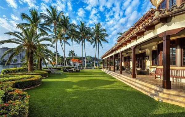 Palatial Palm Beac Inspired Mansion with 665 Feet of Wrap-Around Water ...