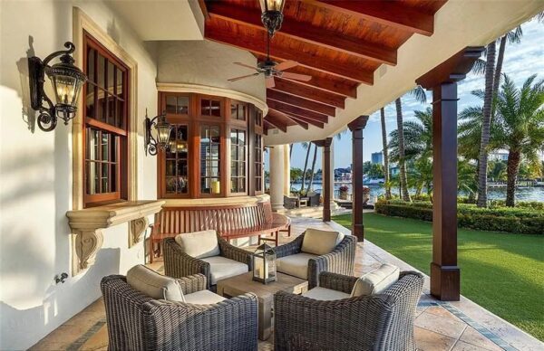 Palatial Palm Beac Inspired Mansion with 665 Feet of Wrap-Around Water ...