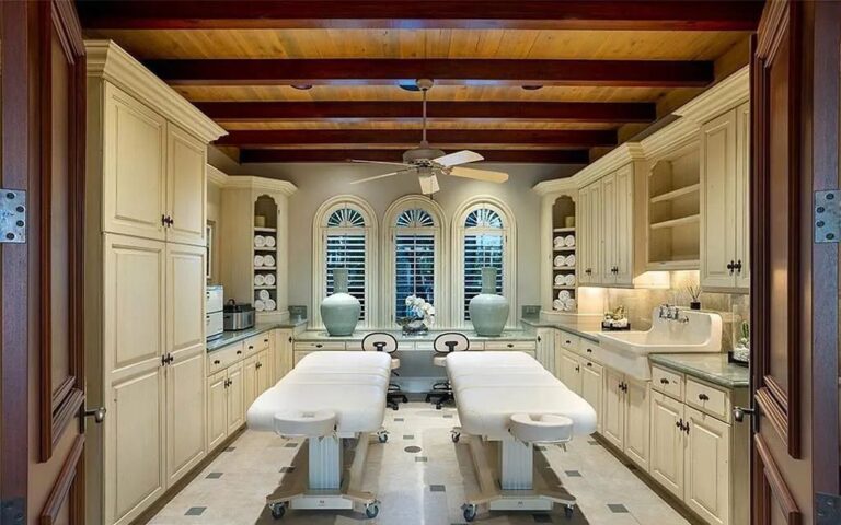 Palatial Palm Beac Inspired Mansion with 665 Feet of Wrap-Around Water ...