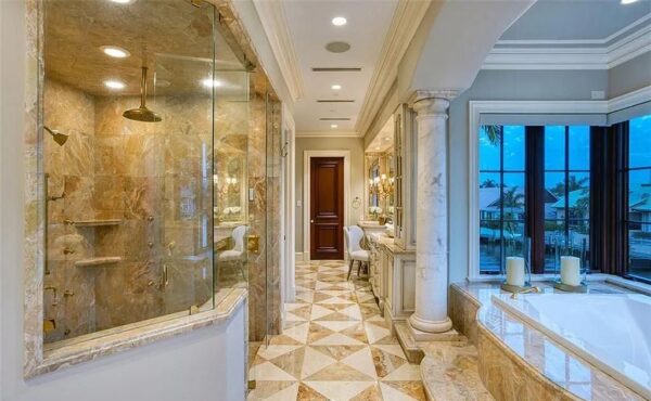 Palatial Palm Beac Inspired Mansion with 665 Feet of Wrap-Around Water ...