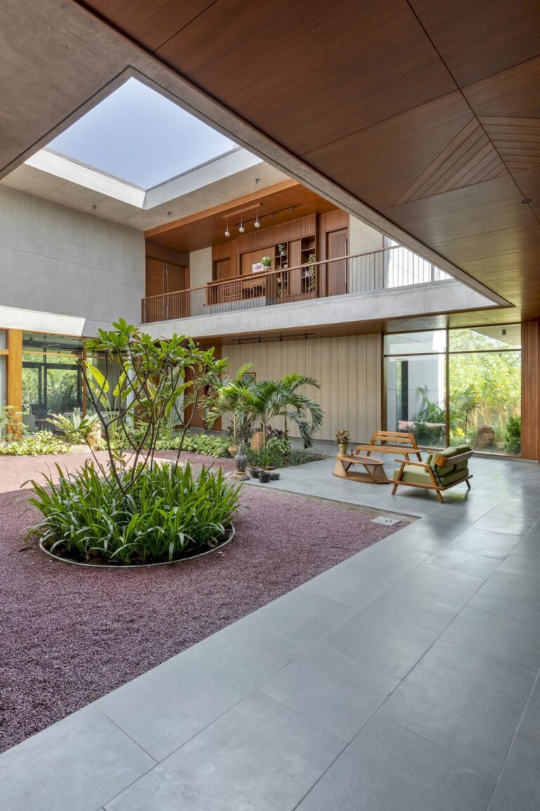 The Monolithic House Features Open & Green Spaces by MODO Designs