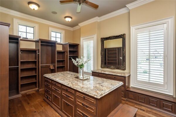 Luxurious Living Redefined: Timeless Elegance in Iowa's Stucco and ...