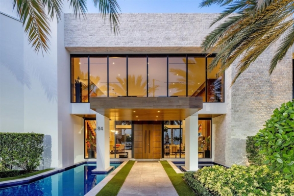 Opulent Waterfront Property with Expansive 90-Foot Lap Pool in Fort ...
