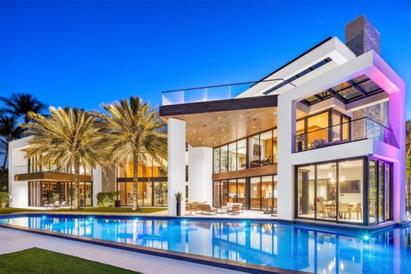 Opulent Waterfront Property with Expansive 90-Foot Lap Pool in Fort ...